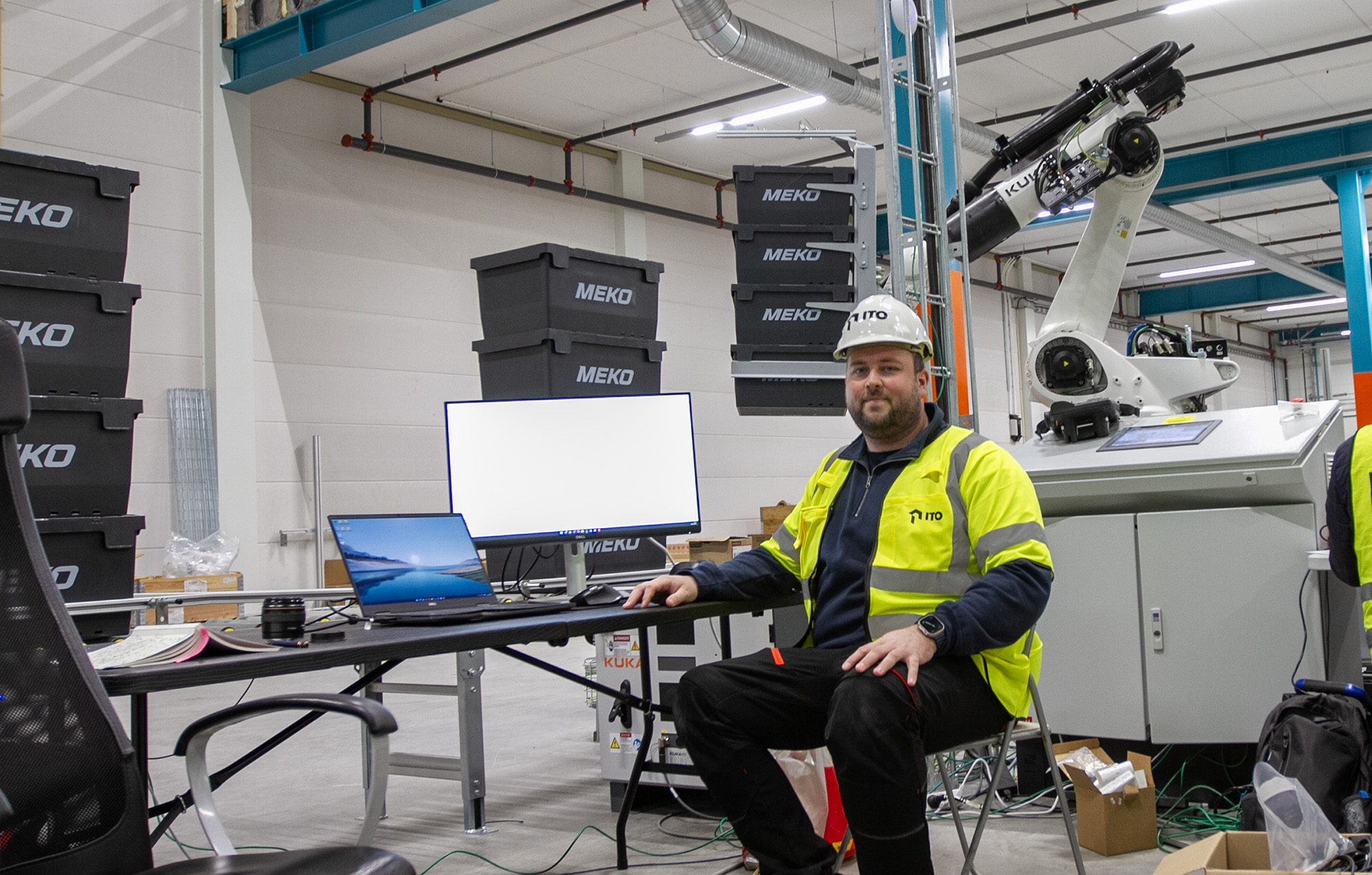 Programmerer med hjelm og vernesko - ITO